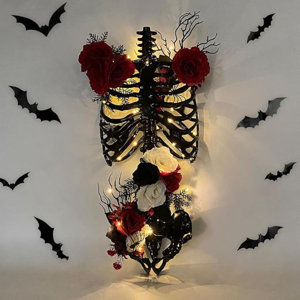 The Holiday Aisle® Halloween Floral Skeleton Torso Decor. | Wayfair