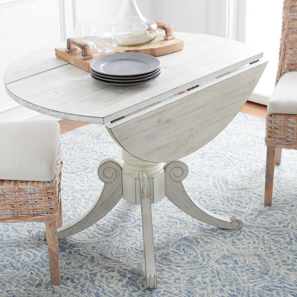 Alcott Hill® Cecelia Extendable Round Solid Wood Dining Table & Reviews ...