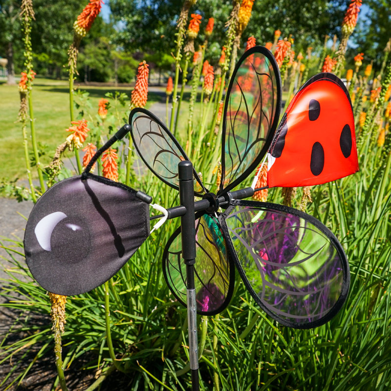 In The Breeze Pivoting Ladybug Spinner | Wayfair