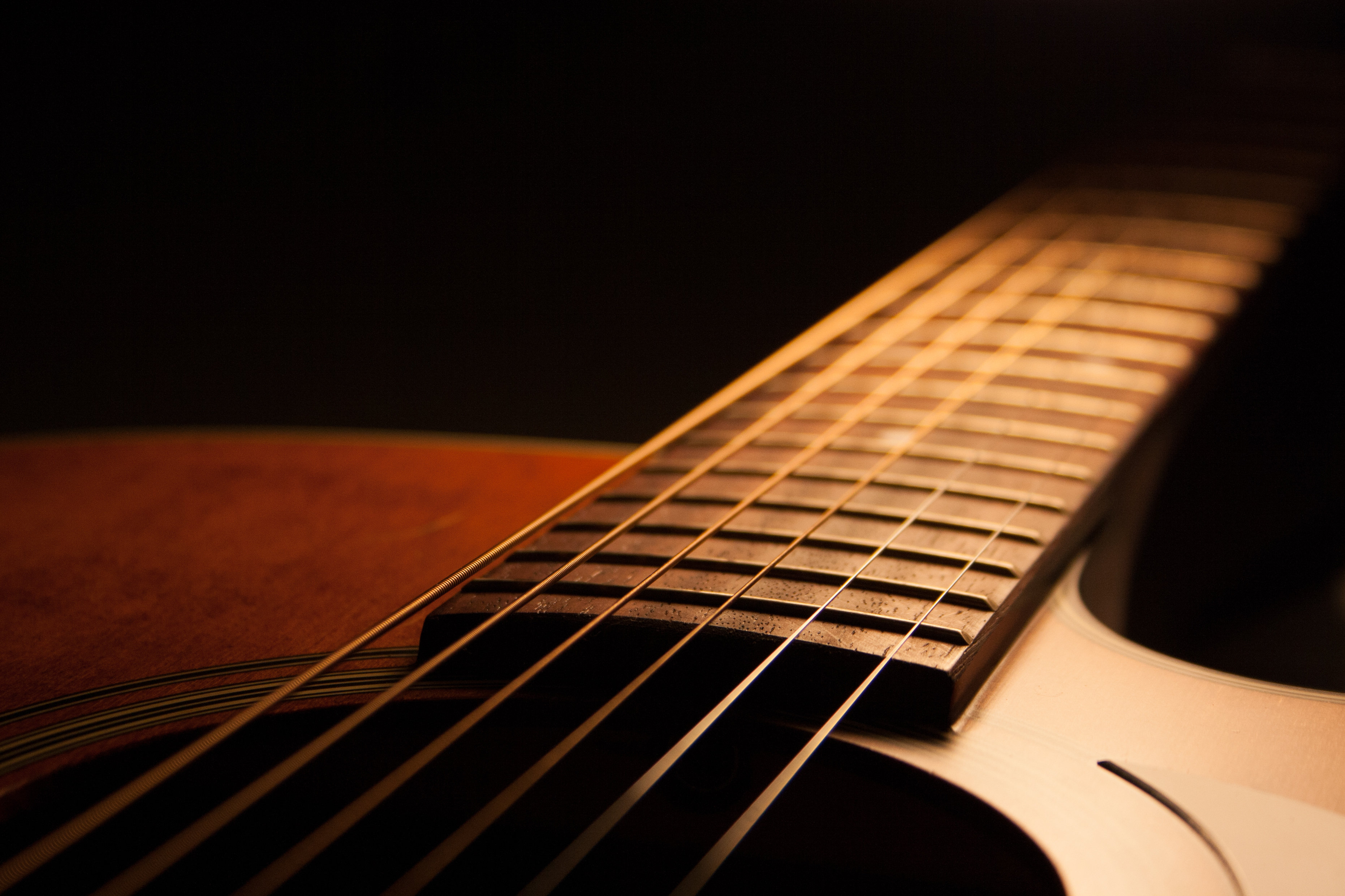 Ebern Designs Low Light Guitar - Wrapped Canvas Photograph | Wayfair