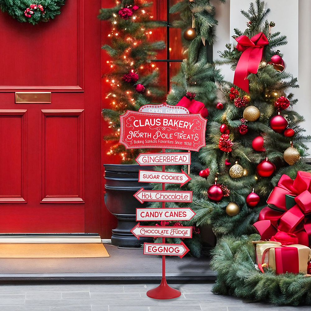 The Holiday Aisle® Directional North Pole Stangding Christmas Sign ...