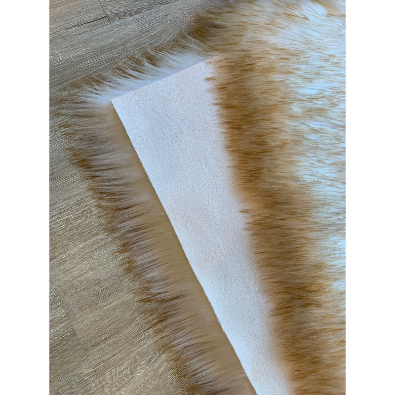 Everly Quinn Mar Vista Eternity Shag Faux Sheepskin Rug In White/Brown ...