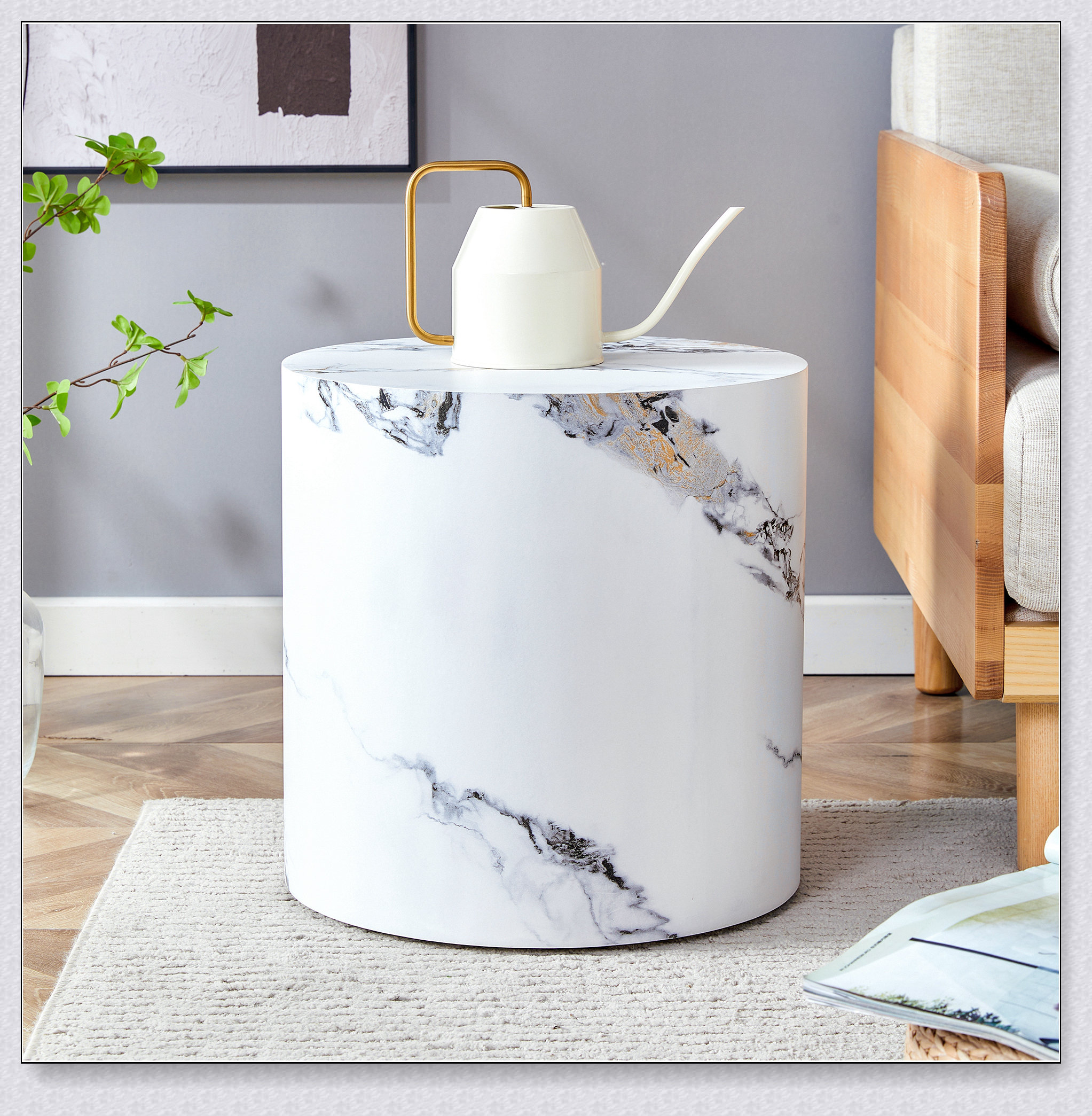 Ebern Designs The cylindrical table with its patterned design can be ...
