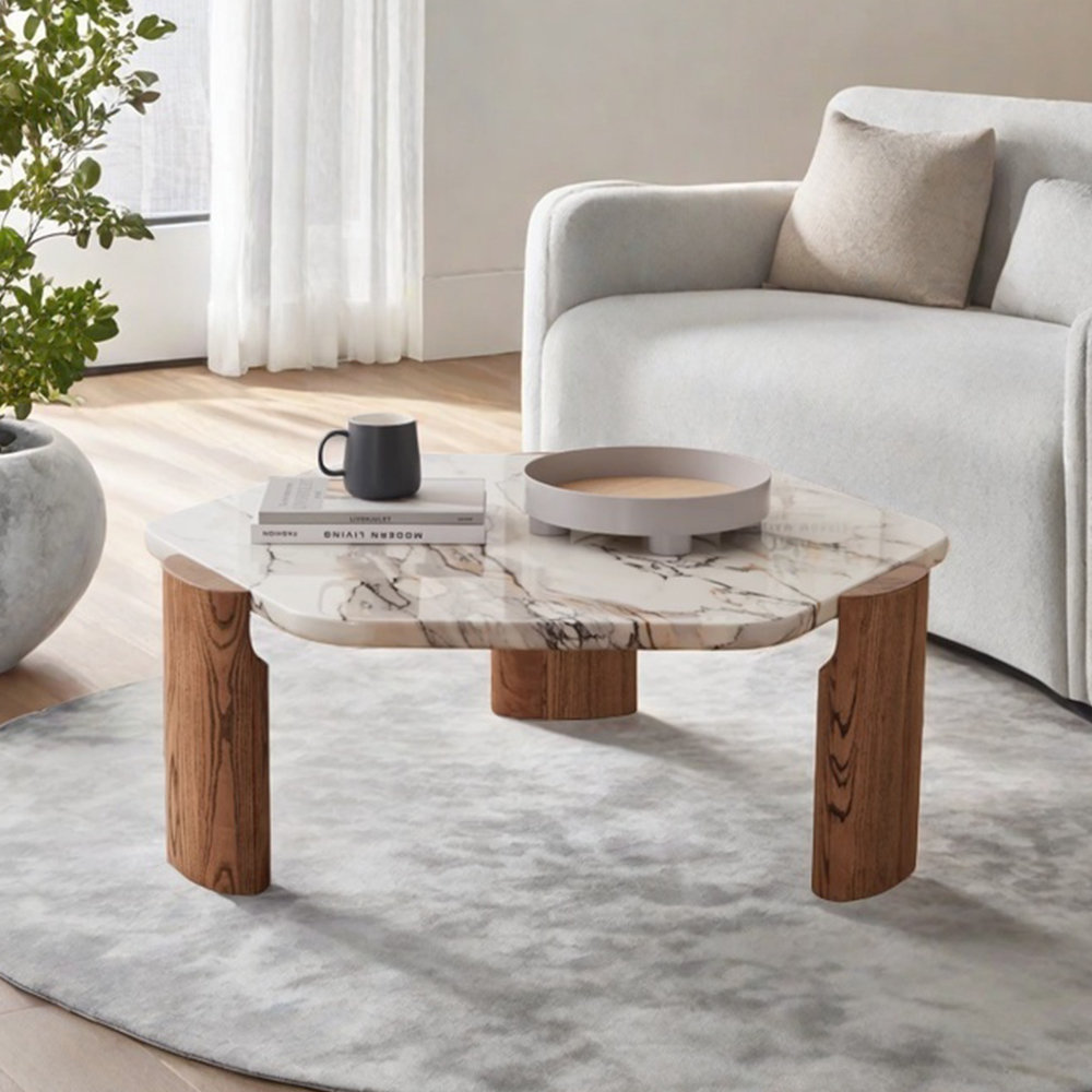 Trentastic Trails Design sense shaped marble coffee table | Wayfair