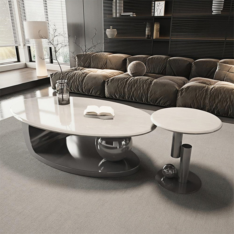 The Invincibles home Simple oval marble coffee table | Wayfair