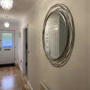 Etta Avenue Javin Round Metal Swirl Framed Wall Mounted Accent Mirror ...