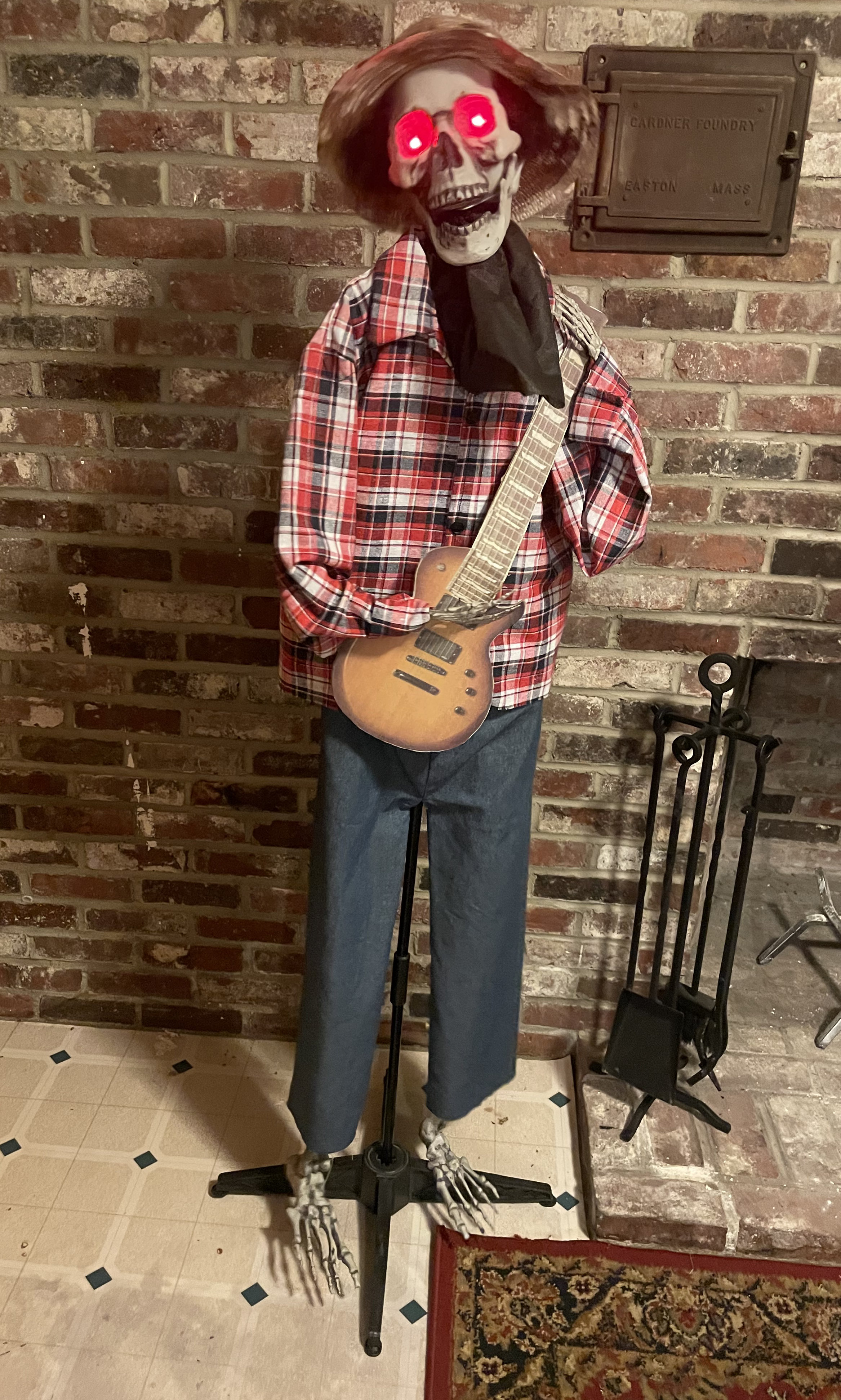 The Holiday Aisle® 60" Halloween Animated Standing Skeleton with Guitar ...