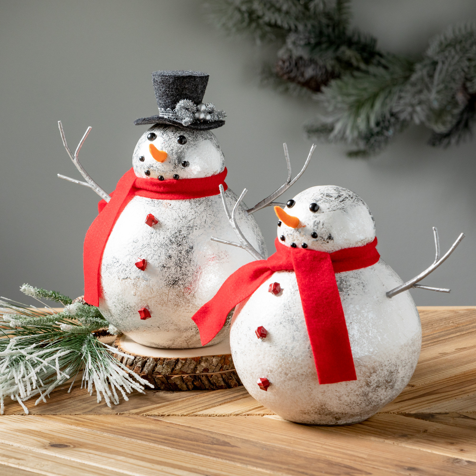The Holiday Aisle® 9.5"H And 11.25"H Shiny Round Snowman Figure Set ...