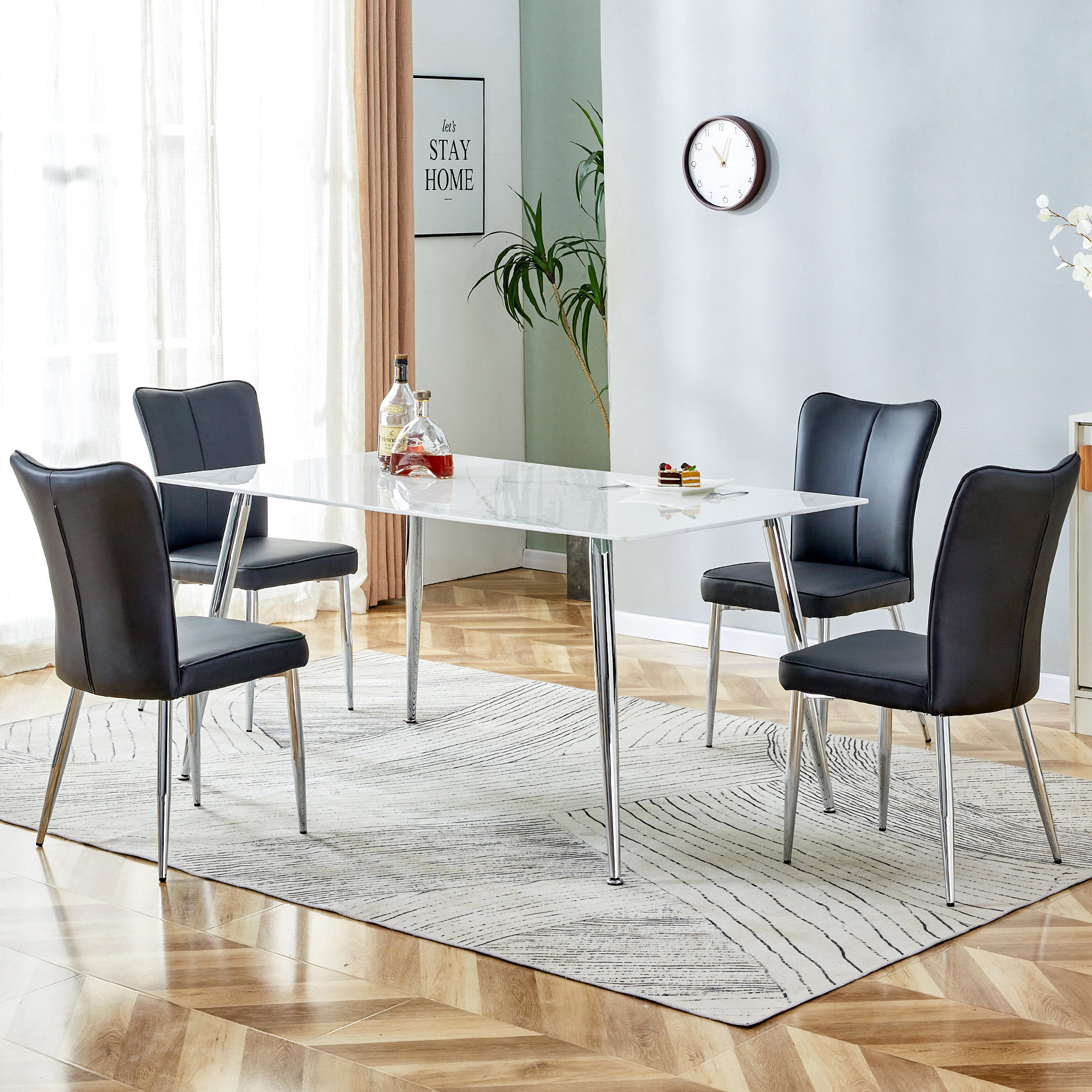 Orren Ellis Elegant Dining Set: 1 White Marble-look Table & 4 Black Pu Chairs With Silver Metal ...