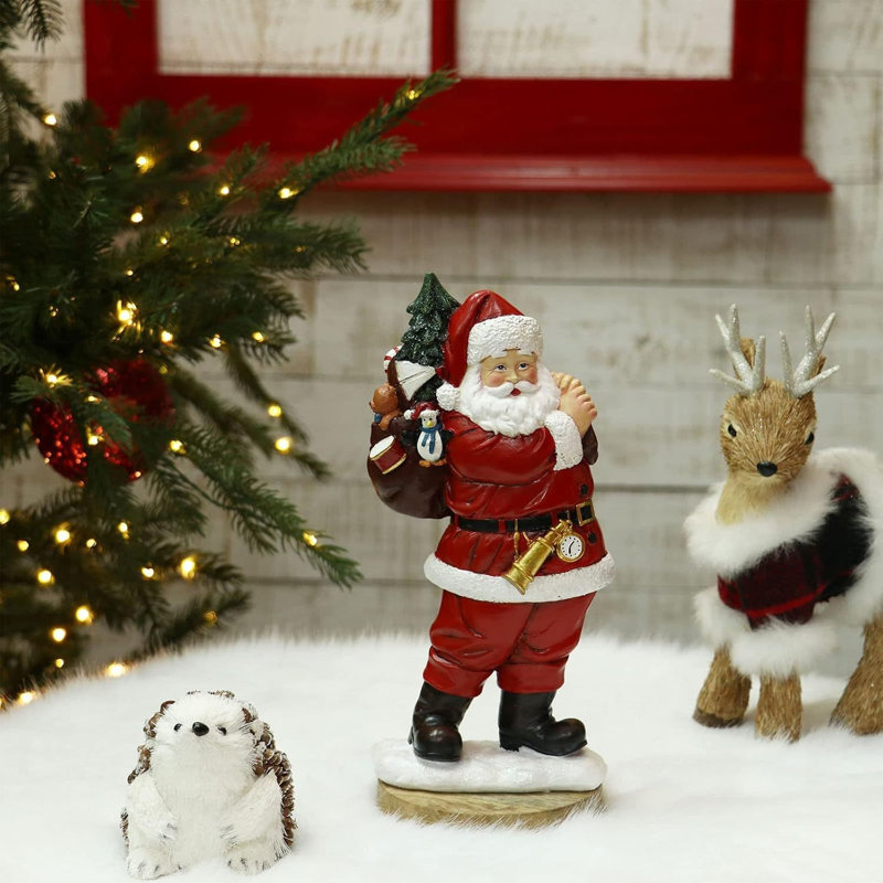 Ophelia & Co. 11-inch Resin Santa Claus Figurine/Sculpture | Wayfair