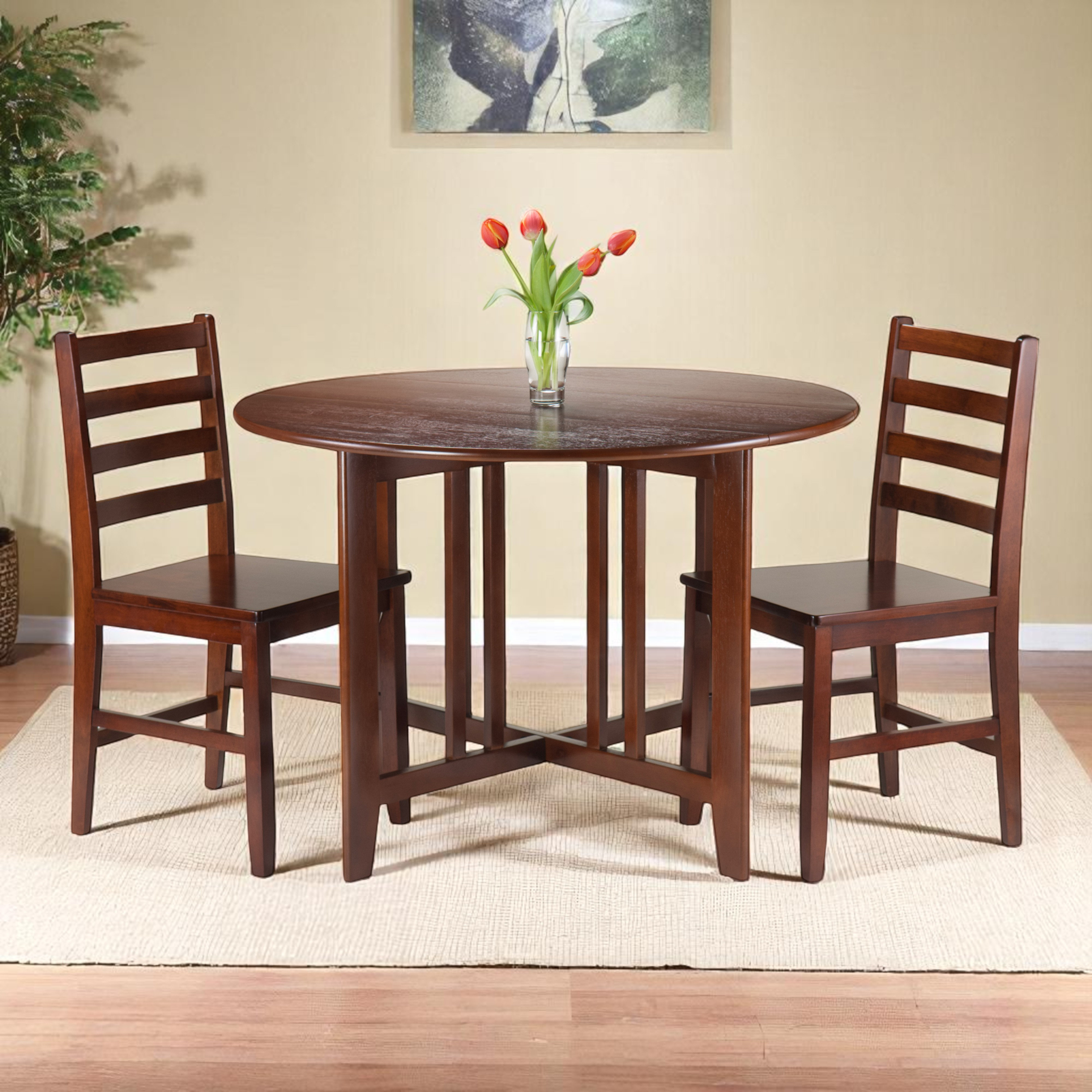 Lark Manor™ Jachai Walnut round drop leaf table with ladder-back chairs ...