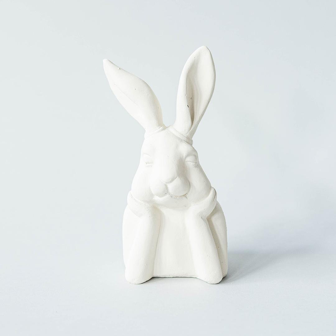 Trinx White Rabbit Leaning On Its Paws Figurine | Wayfair