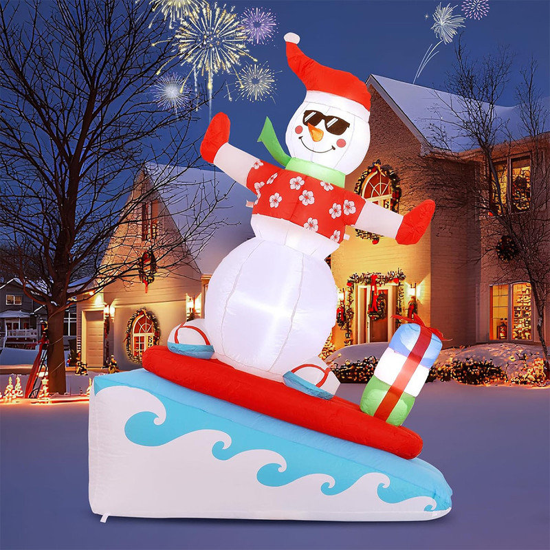 The Holiday Aisle® 6FT Inflatable Snowman with LED Lights Surfing ...