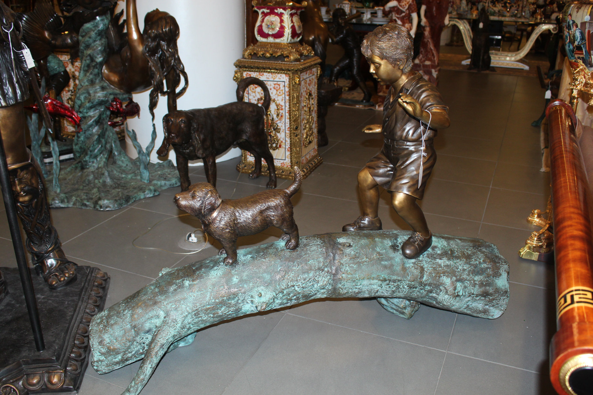 Nifao Statues Kid with Dog Walking on a Log Statue | Wayfair