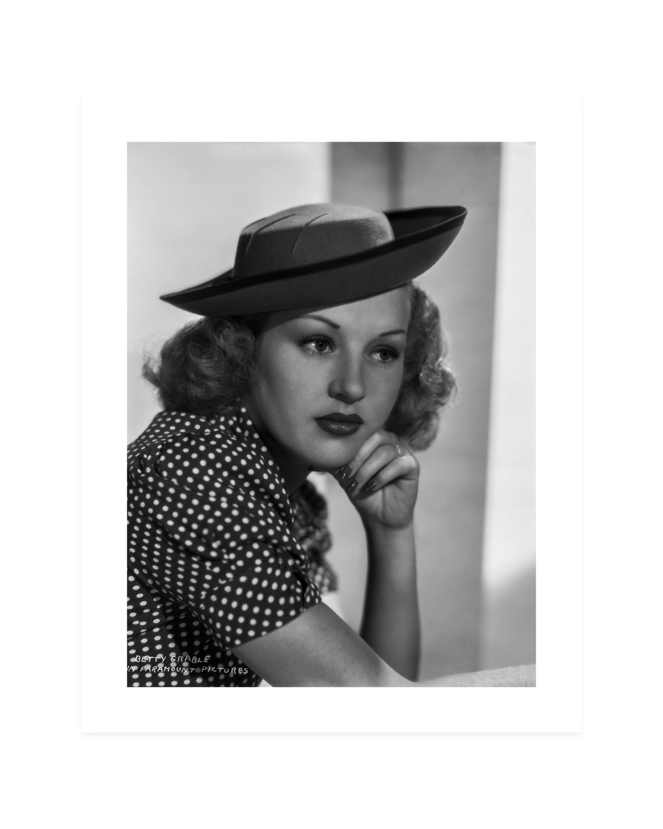 Globe Photos Entertainment Betty Grable With Hand On Chin On Paper ...