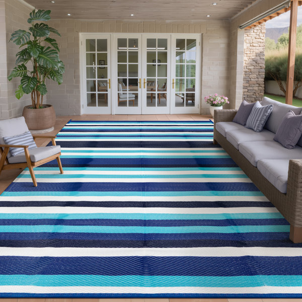 Highland Dunes Ellie Waterproof Striped Reversible Outdoor Rug ...