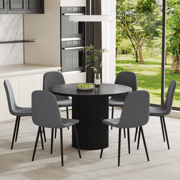 7-Piece Dining Table Set Featuring A Black Wooden Tabletop And ...