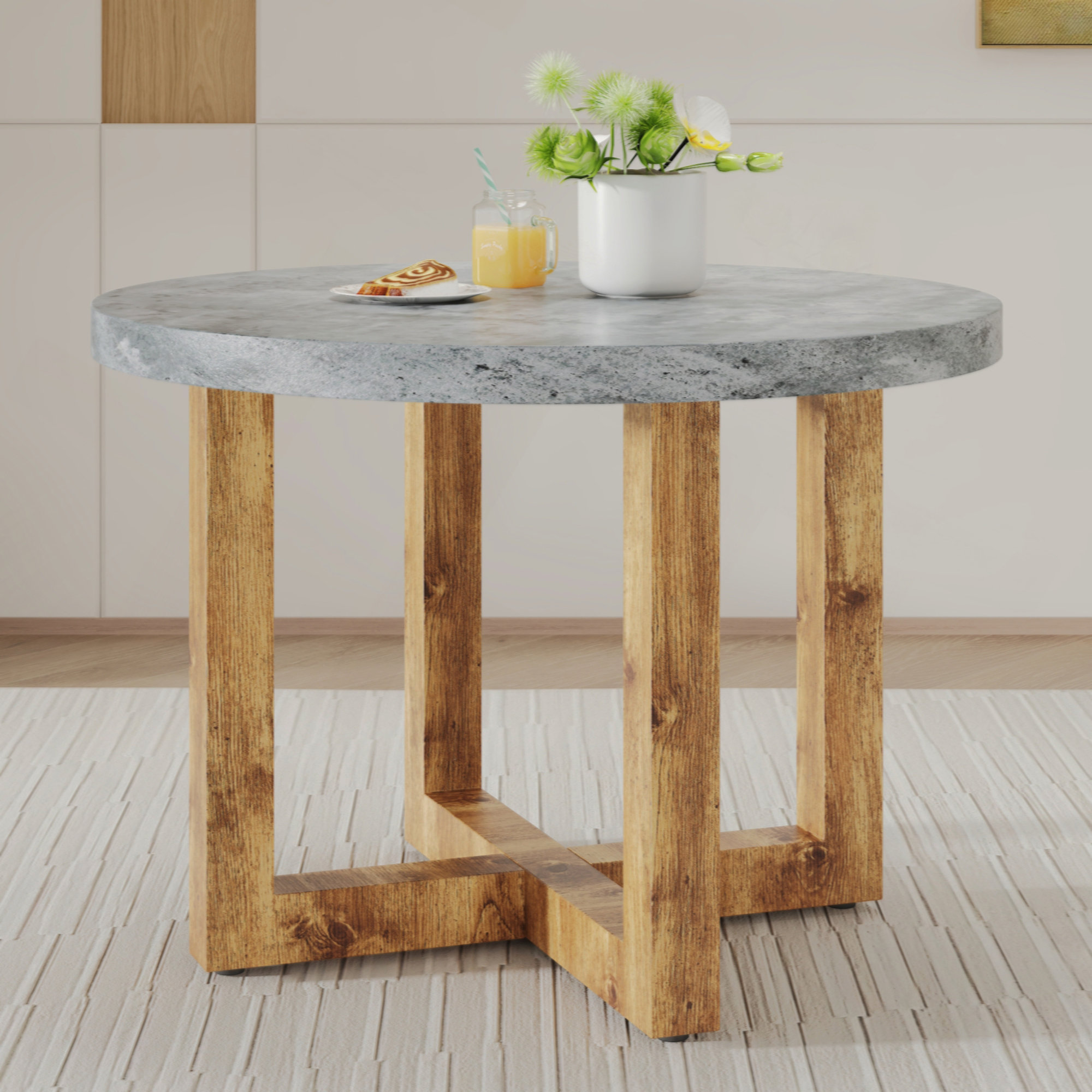 Brayden Studio A Modern And Practical Circular Dining Table. Made Of ...