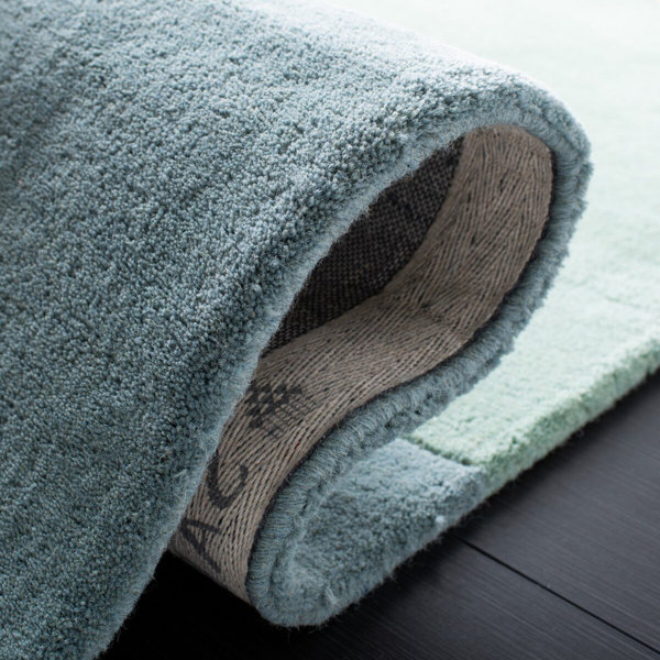 AllModern Tapis doré en laine touffeté à la main Abstract et ...