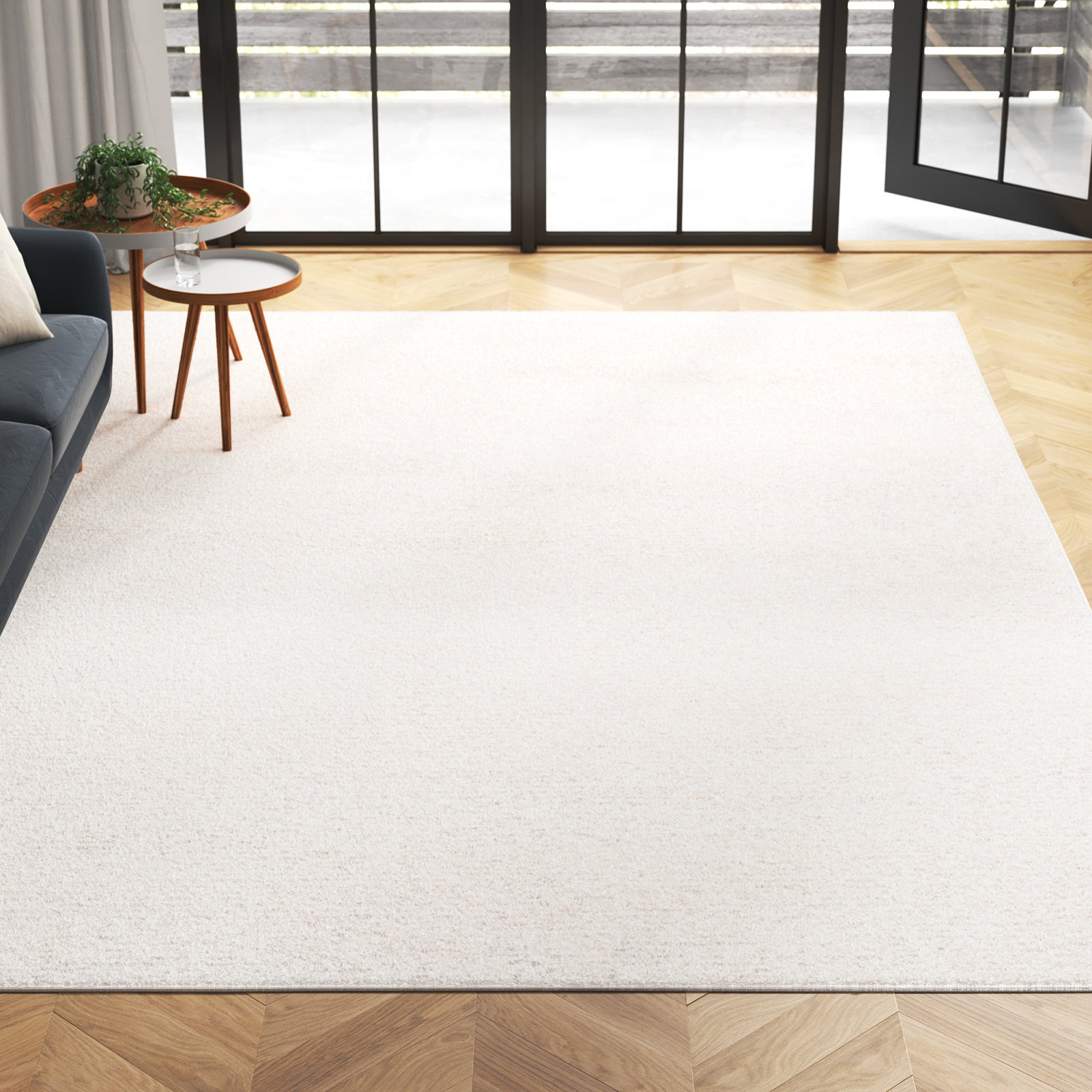 Wade Logan® Autin Solid Color Machine Woven Polyester Area Rug in Ivory ...