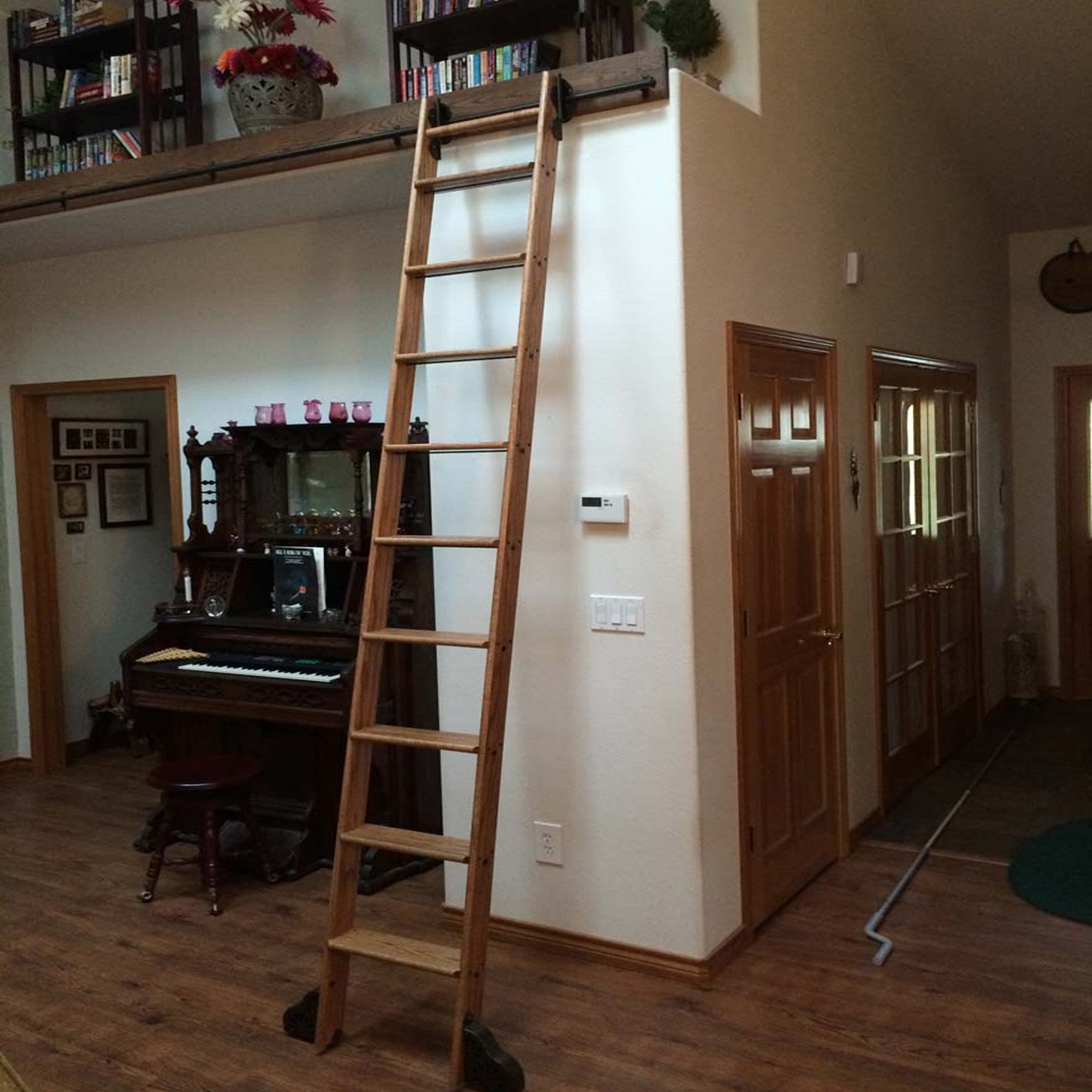 Quiet Glide Red Oak 9.92' 9-Step Wood Rolling Sunburst Wheel Ladder ...