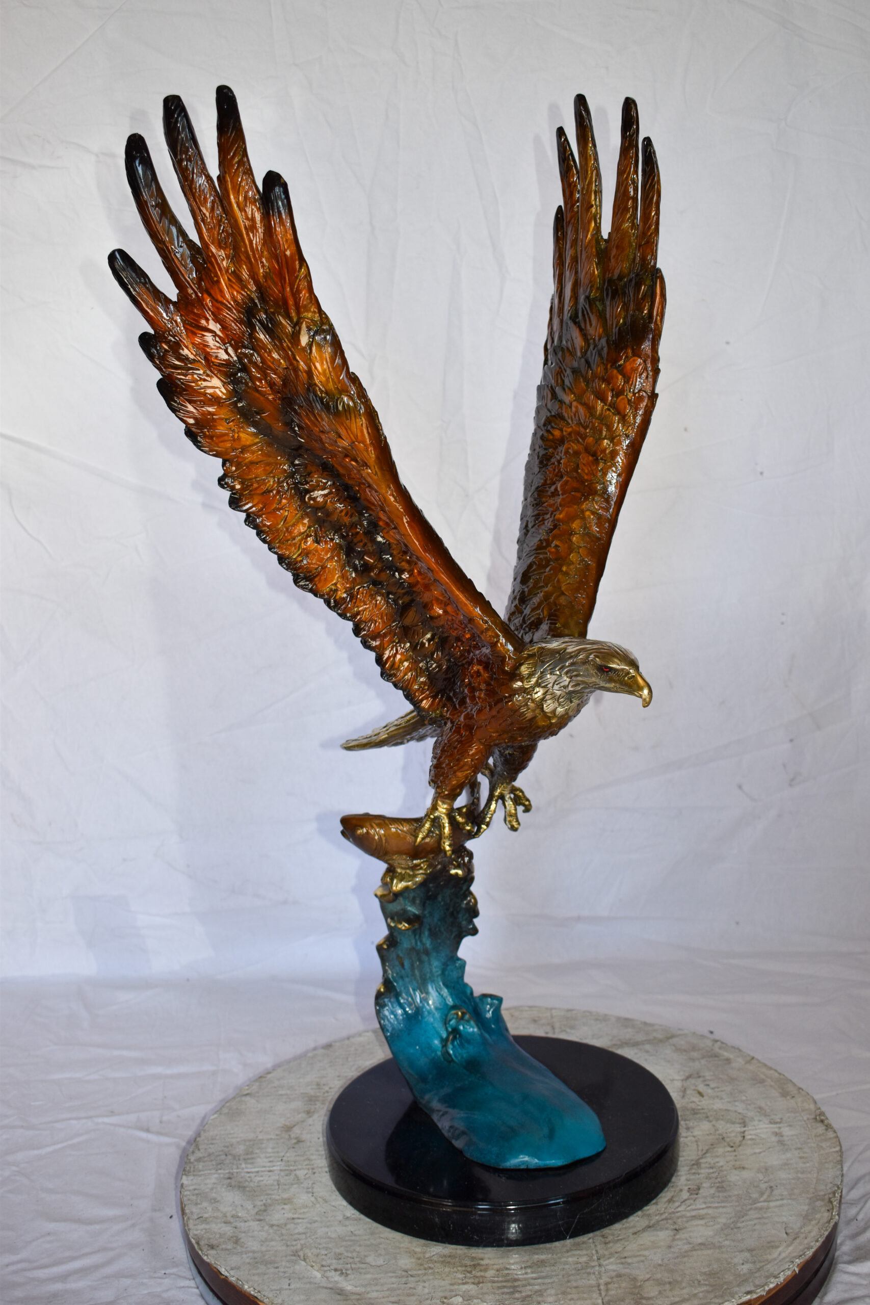 Loon Peak® Daon Eagle In Action Catching a Fish from Water Bronze ...