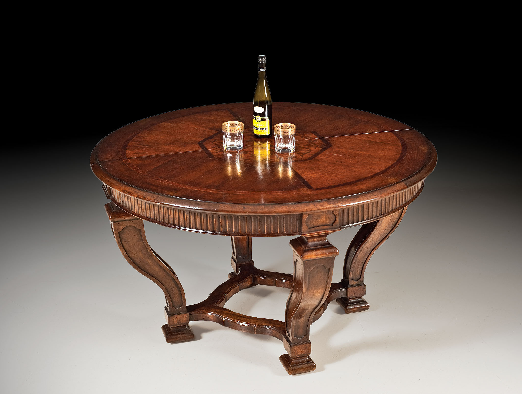 David Michael Extendable Round Solid Wood Dining Table | Wayfair
