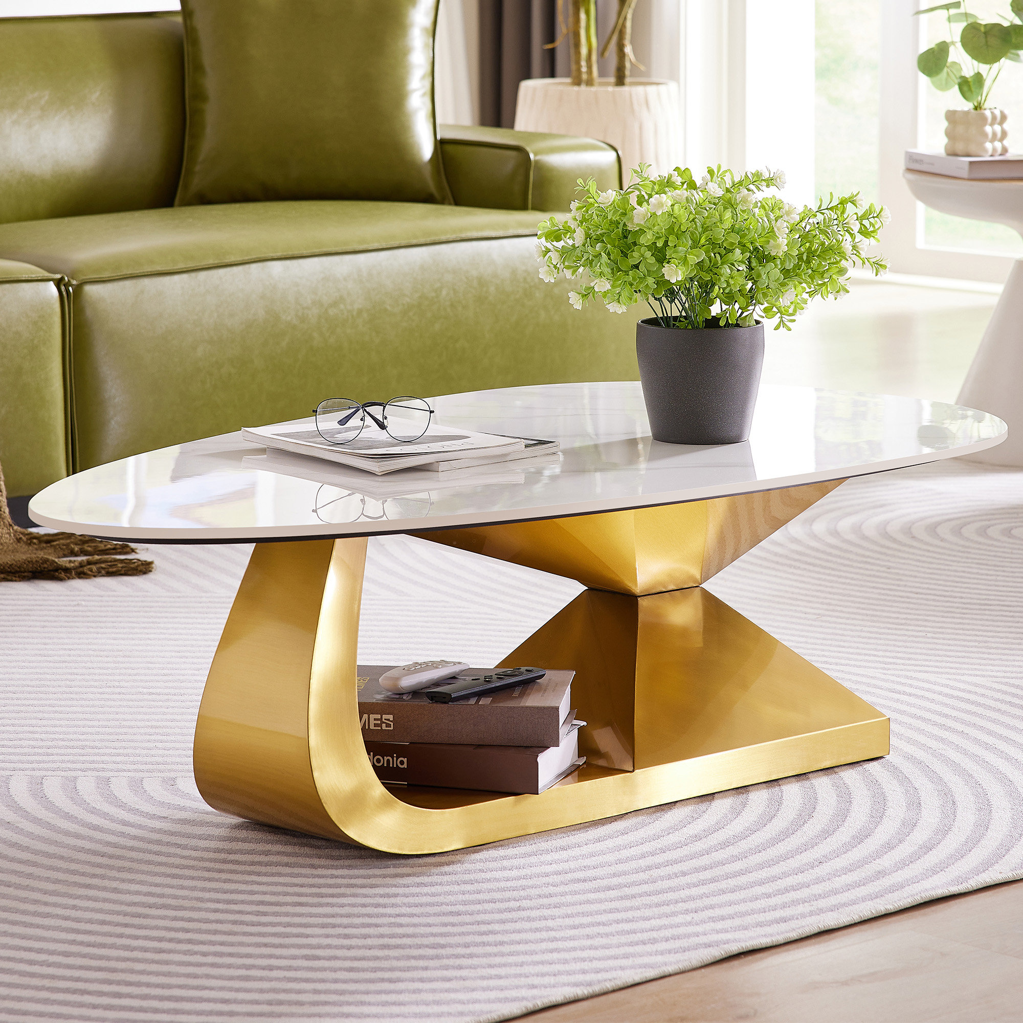 Orren Ellis Contemporary Marble Coffee Table With Dolphin-Inspired Base ...