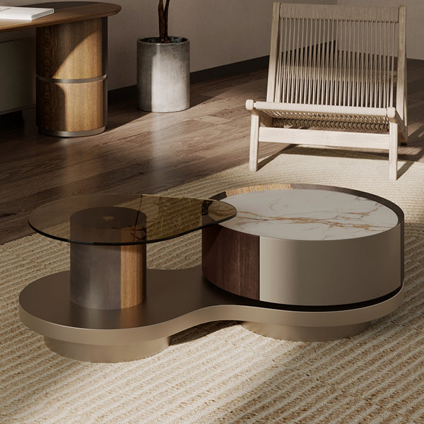 Brayden Studio Delly 53.1" Oval Glass and Stone Rotating Coffee Table ...