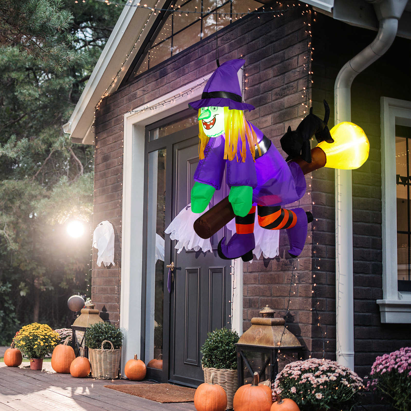 The Holiday Aisle® 47 In. Halloween Inflatable Hanging Witch | Wayfair