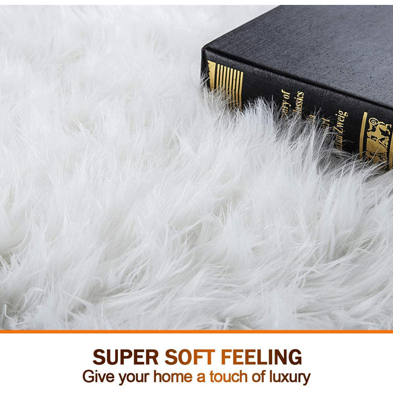 Mercer41 Pinckney Faux Sheepskin Solid Color Rug & Reviews | Wayfair