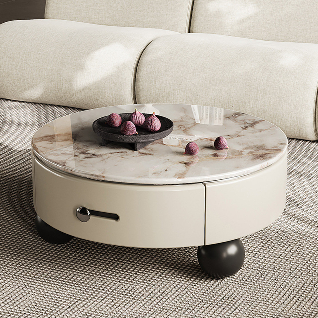 Trentastic Trails Round microcrystalline stone coffee table | Wayfair