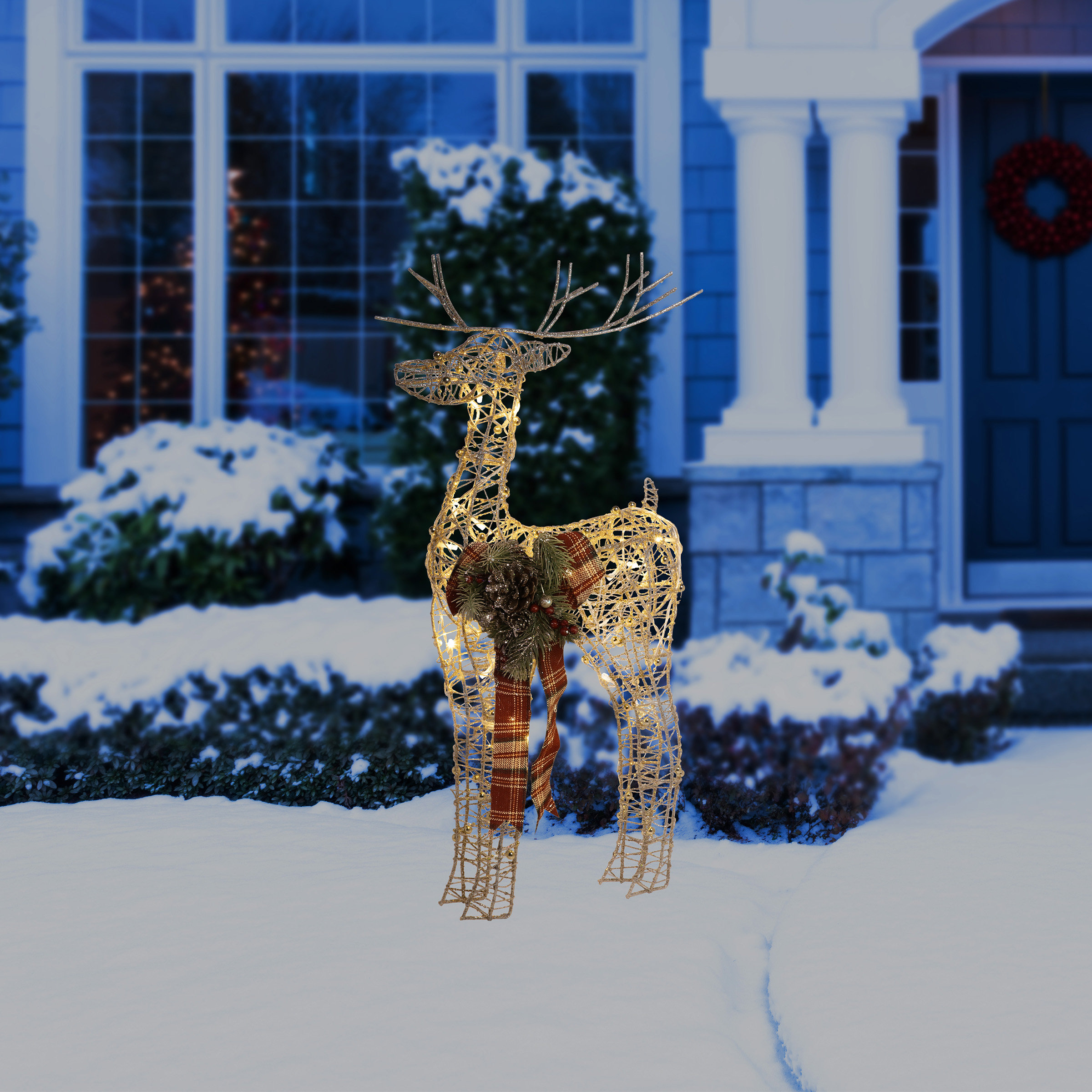 The Holiday Aisle® Christmas Reindeer Figurine | Wayfair