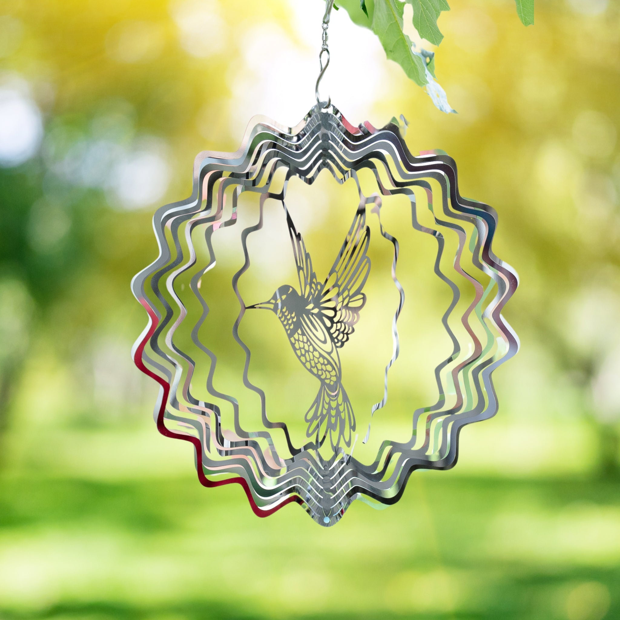 The Holiday Aisle® Twisted Metal Hummingbird Wind Spinner for Garden ...