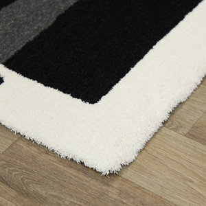 Ivy Bronx Houser Abstract Black Area Rug & Reviews | Wayfair