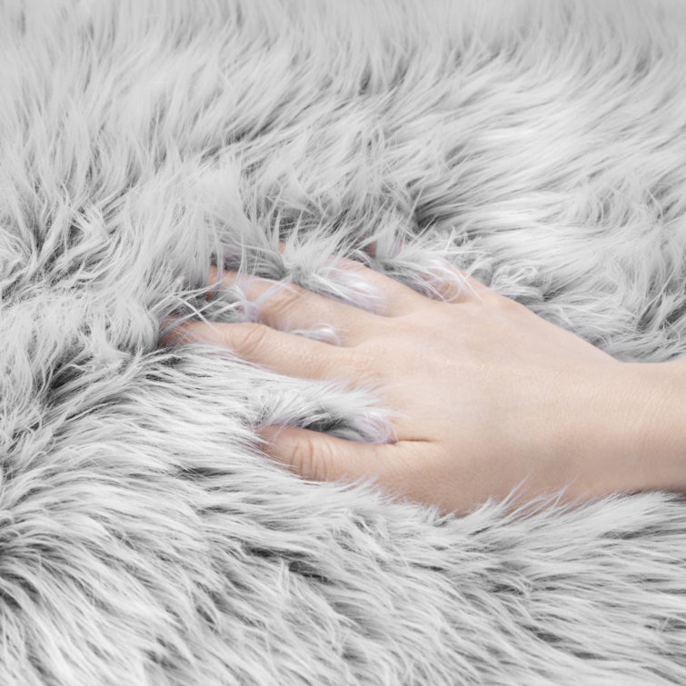 Mercer41 Imerio Faux Fur Solid Color Indoor/Outdoor Rug | Wayfair