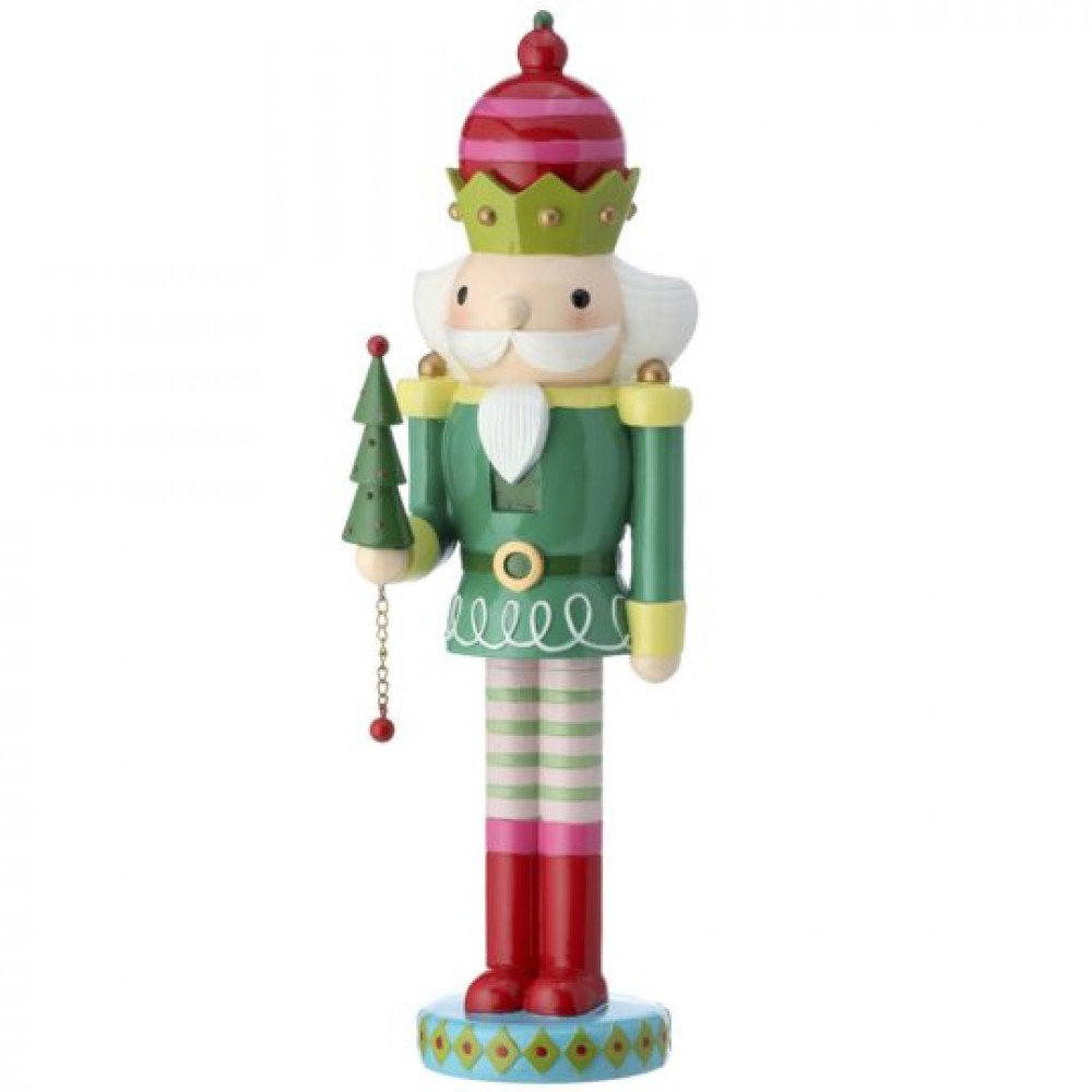 The Holiday Aisle® Nutcracker Holding A Christmas Tree Statuette | Wayfair