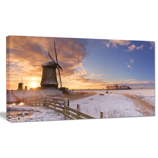 DesignArt " Dutch Windmills At Sunrise " | Wayfair