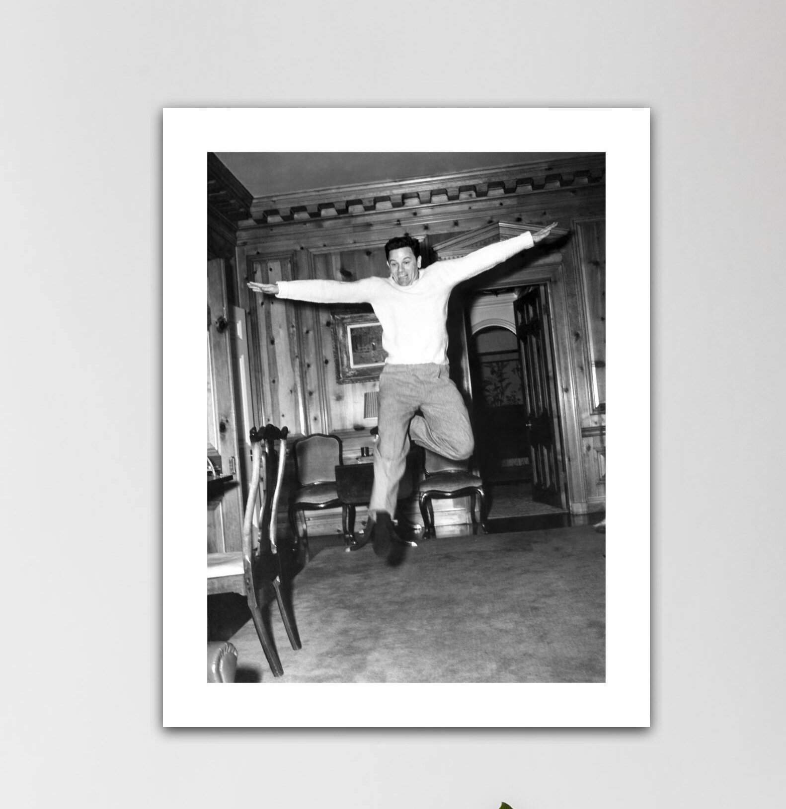 Globe Photos Entertainment & Media John Garfield Jumping in Air ...