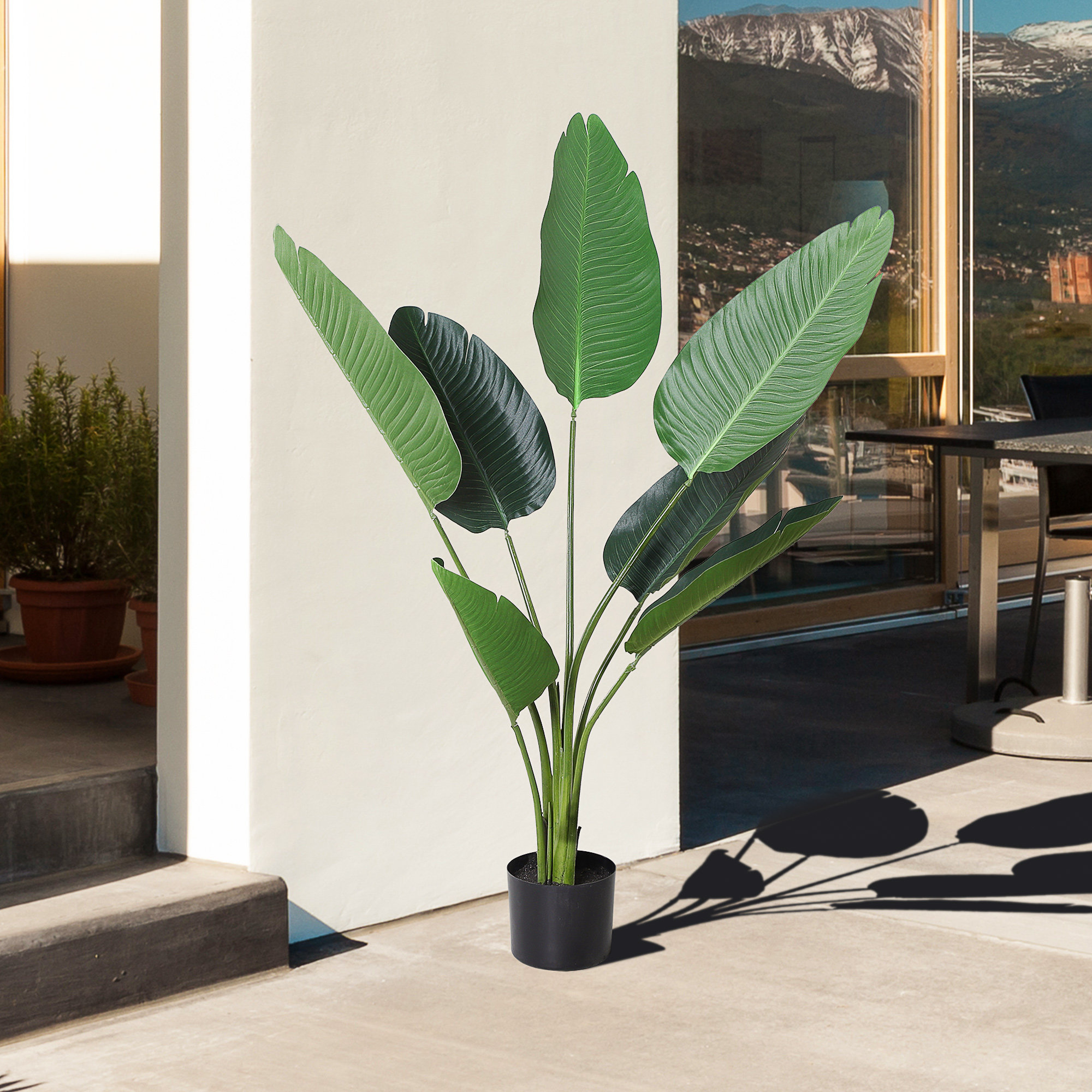 Primrue Cambon Faux Banana Leaf Plant in Planter | Wayfair