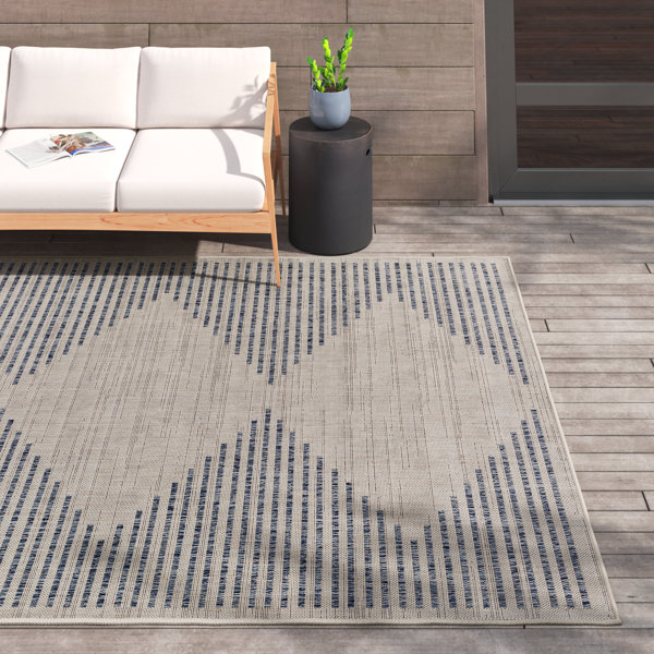 Wade Logan® Calliah Striped Polypropylene Area Rug in Blue/Cream ...
