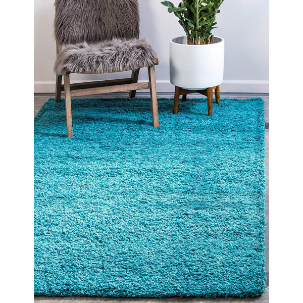 17 Stories Annie-Louise Solid Colour Machine Woven Teal Area Rug ...
