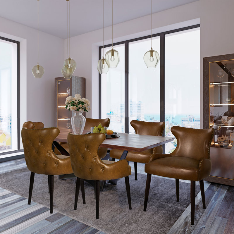 Wildon Home® Nassar Tufted Faux Leather Wing Back Dining Chair | Wayfair