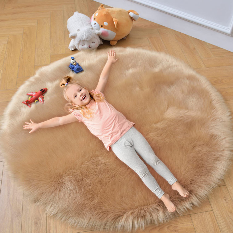 Mercer41 Lianet Faux Sheepskin Solid Color Rug & Reviews | Wayfair