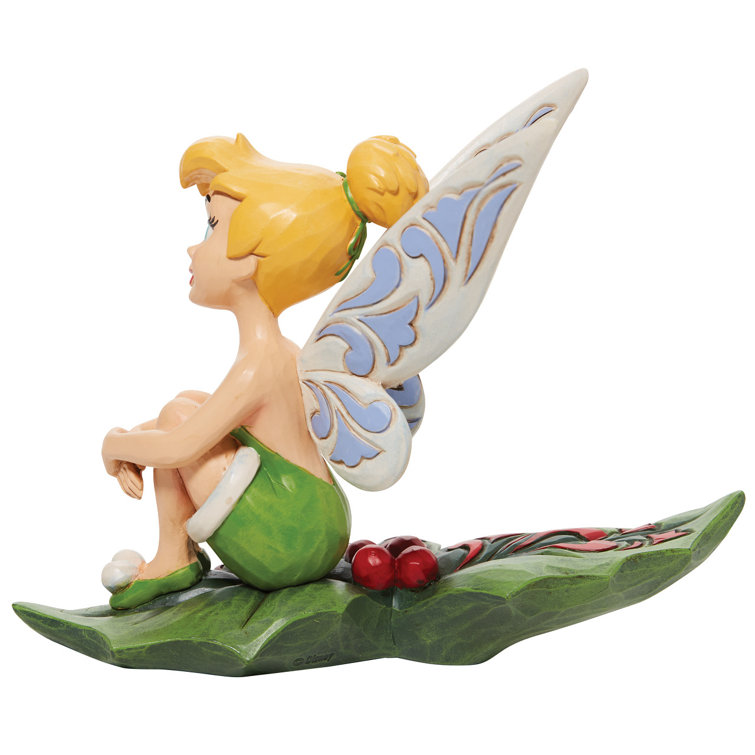 Disney Traditions Tinkerbell Sitting in Holly Figurine | Wayfair.co.uk