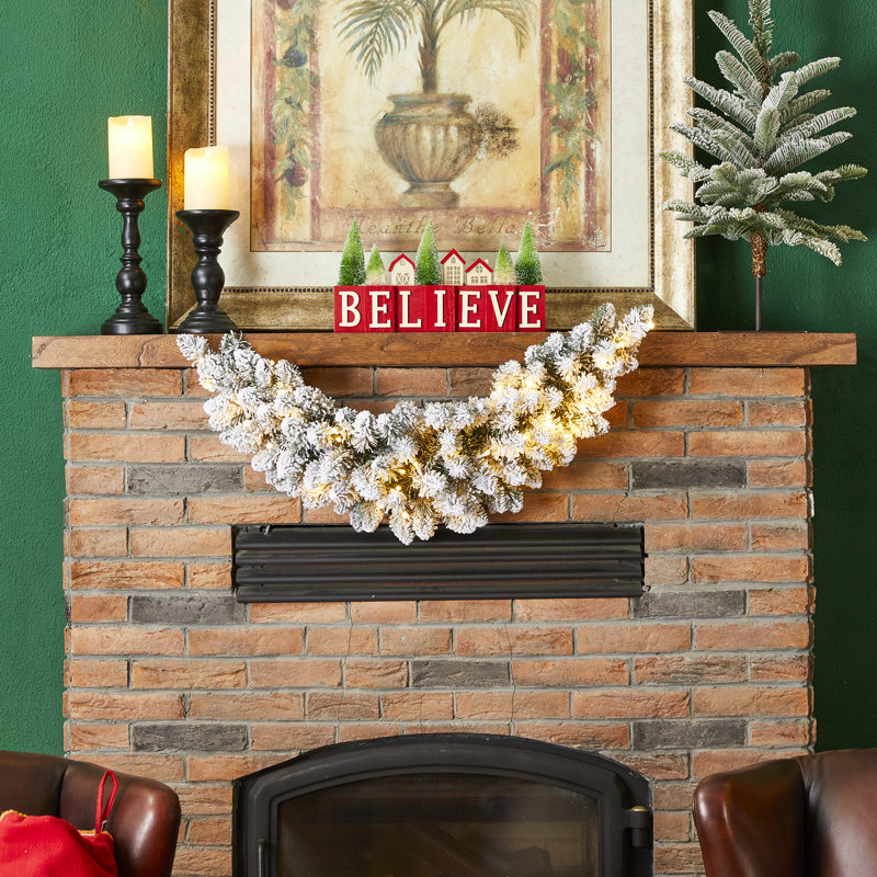 Primrue 3' Pre-Lit Snow Flocked Christmas Faux Swag with Lights | Wayfair