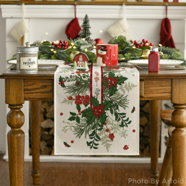 The Holiday Aisle® Holly Pine Cone Leaves Floral Christmas Table Runner ...