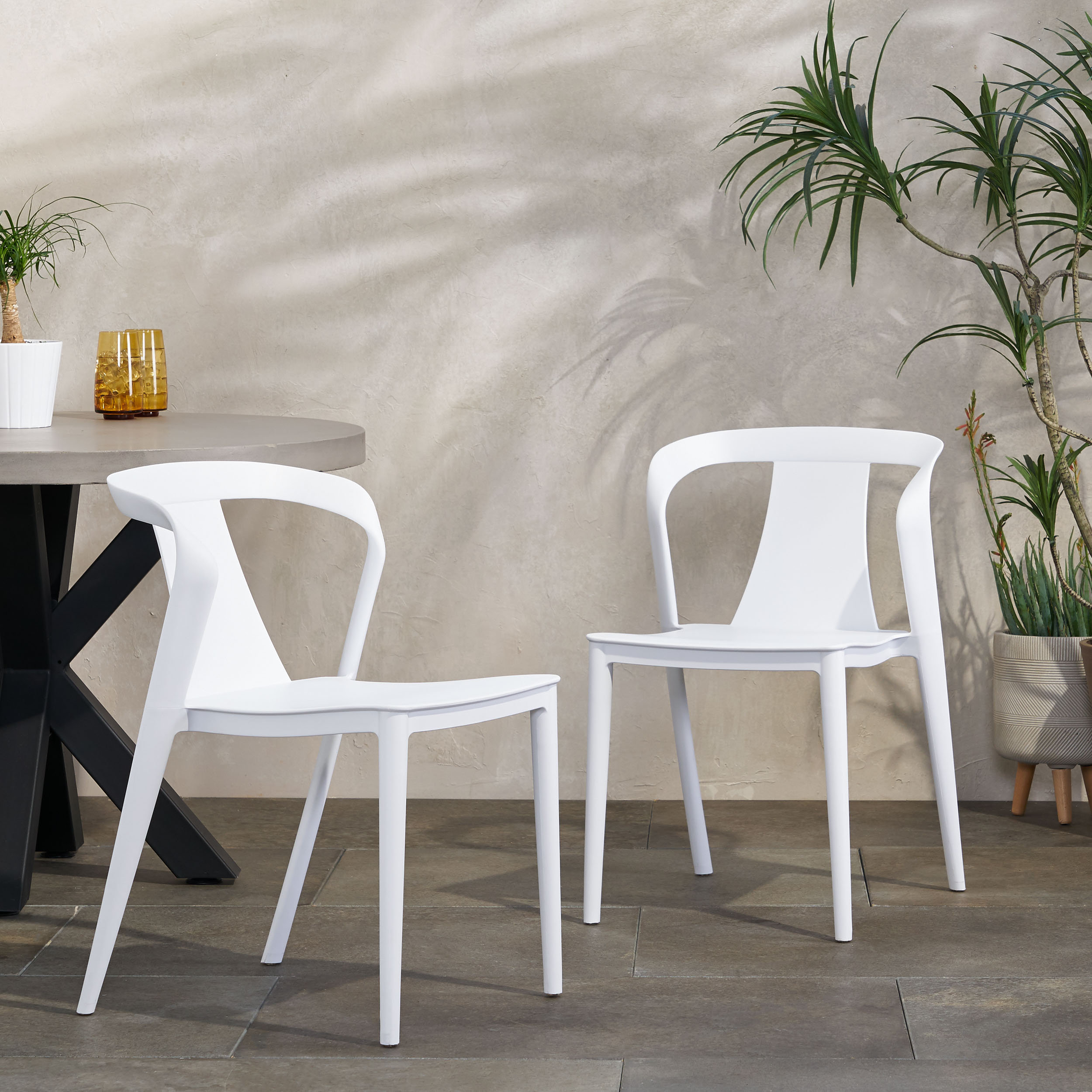 Ebern Designs Kemarian Outdoor Stacking Dining Side Chair & Reviews ...