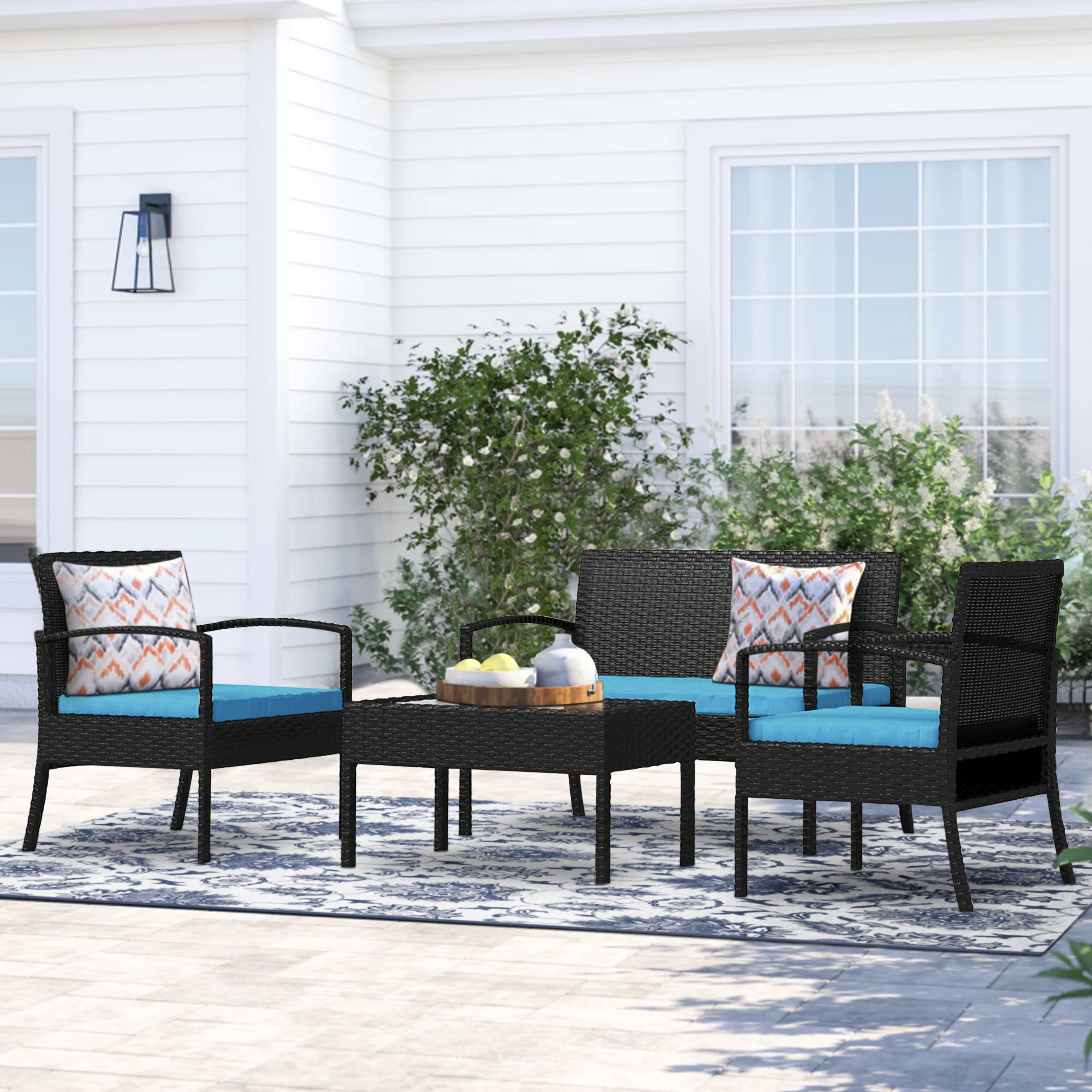 Winston Porter Lutsen 4 Piece Outdoor Rattan Sofa Seating Group with ...
