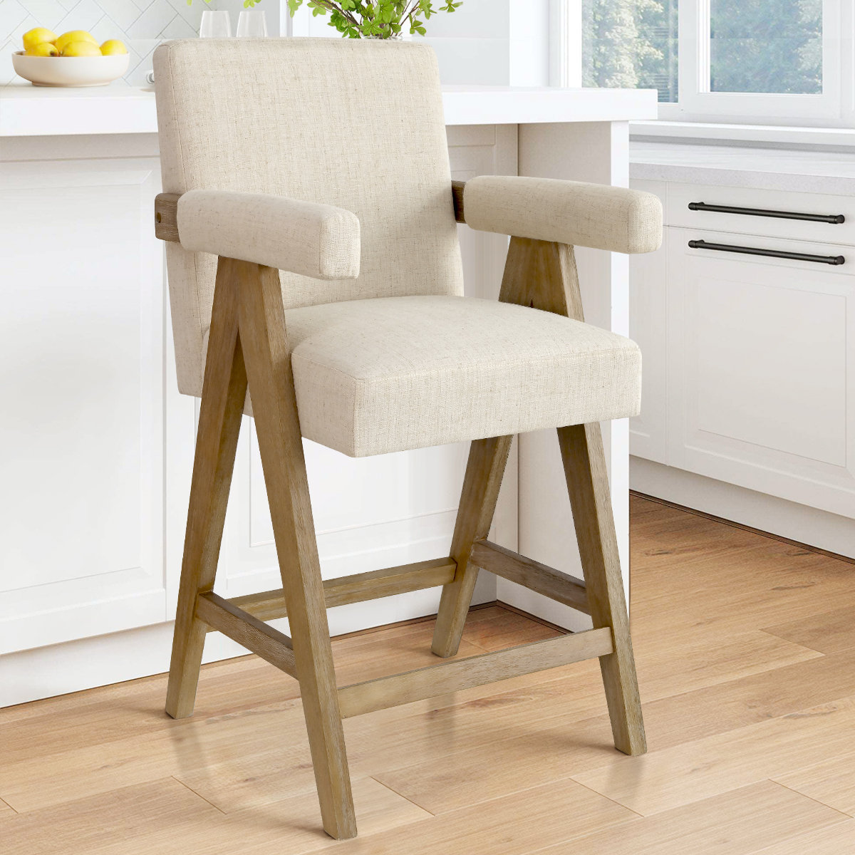 Wade Logan Bilon 25.5'' Linen Upholstered Counter Stool with Arms ...